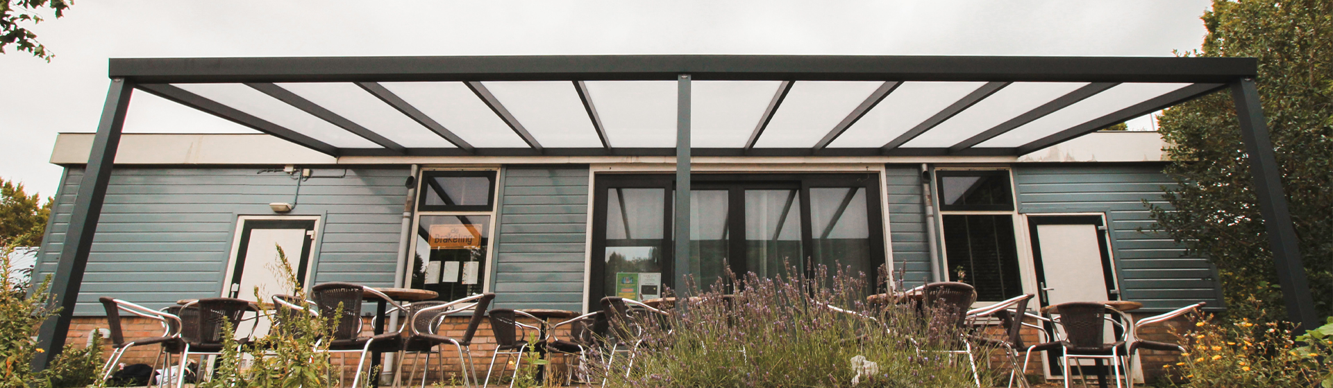 Overkapping met polycarbonaat dak Amsterdam - Van Beem Buitenleven